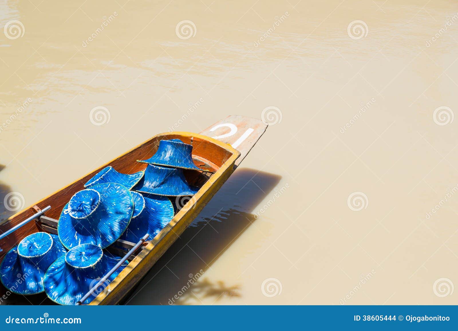 Row boat with hat stock photo. Image of golden, gras - 38605444