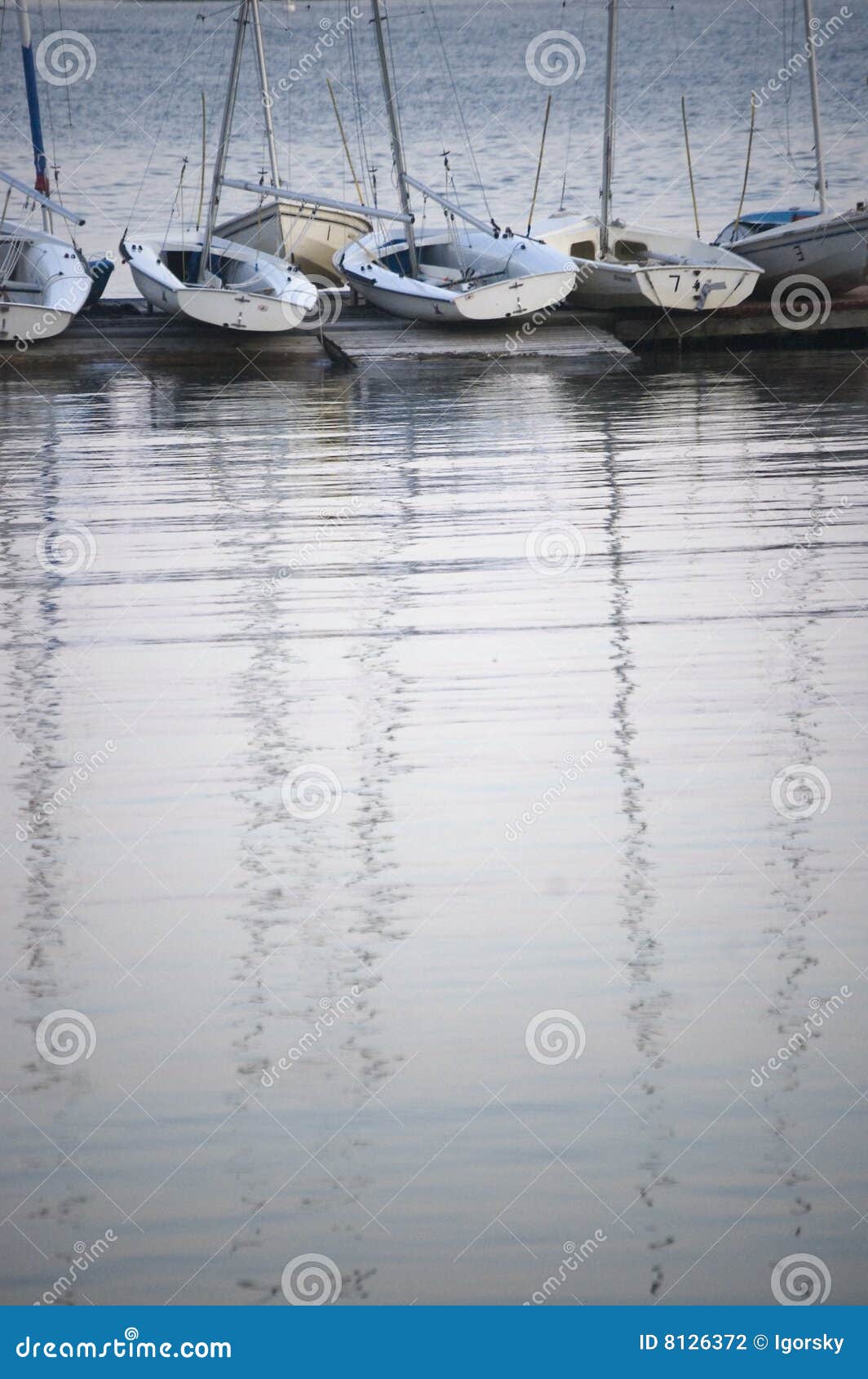 A row of boats stock photo. Image of evening, jetty, vertical - 8126372