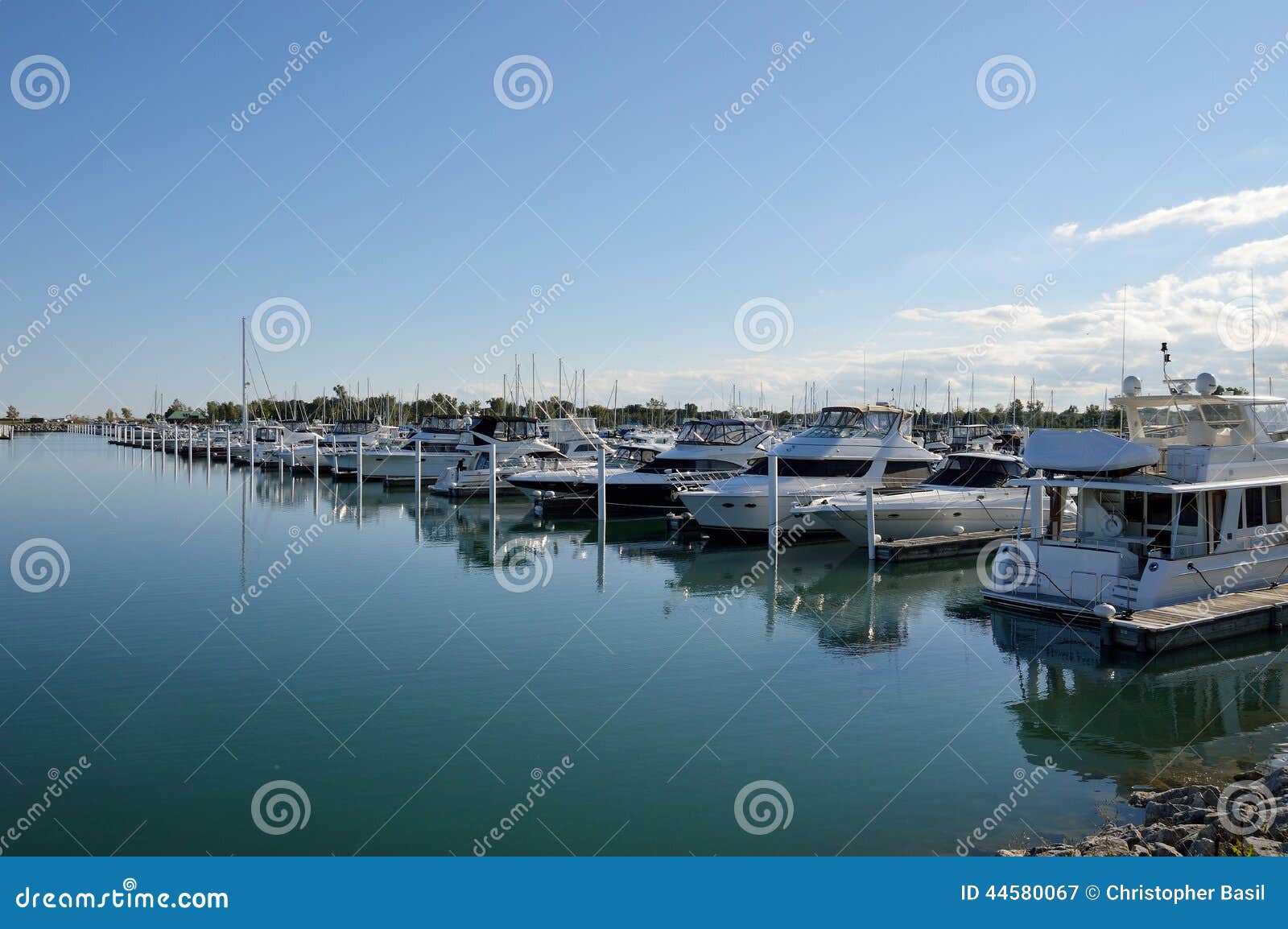 Row of boats in harbor stock image. Image of boats, yacht - 44580067