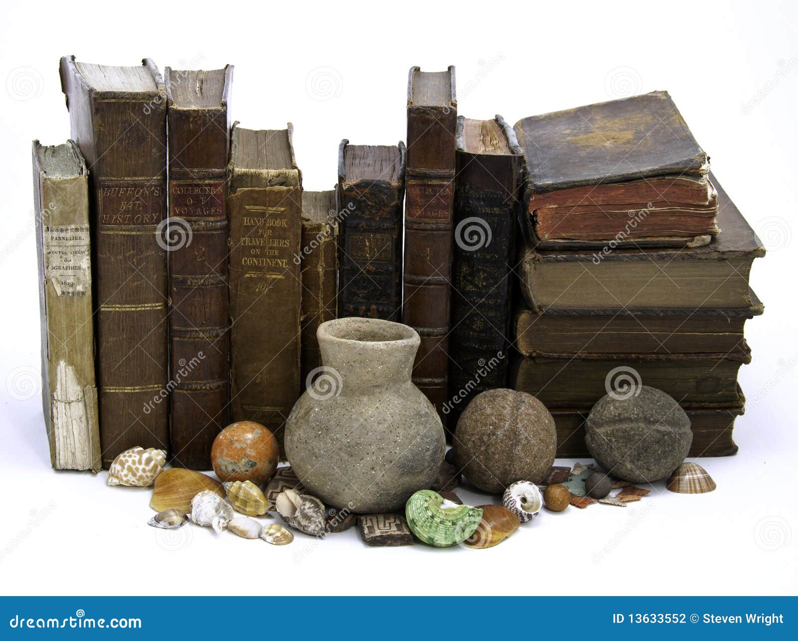 Row of Books and Artifacts stock photo. Image of arrowheads - 13633552