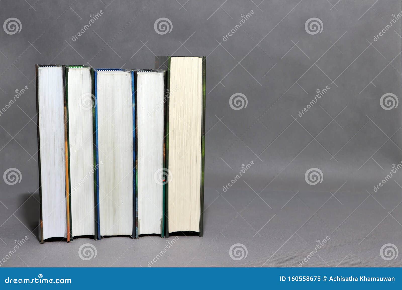 Row of Books Collection on Grey Background Stock Image - Image of ...