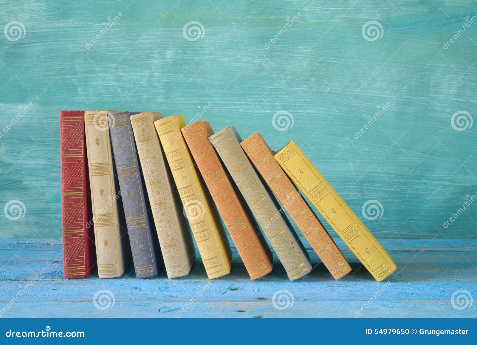 Row of books stock photo. Image of brown, background - 54979650