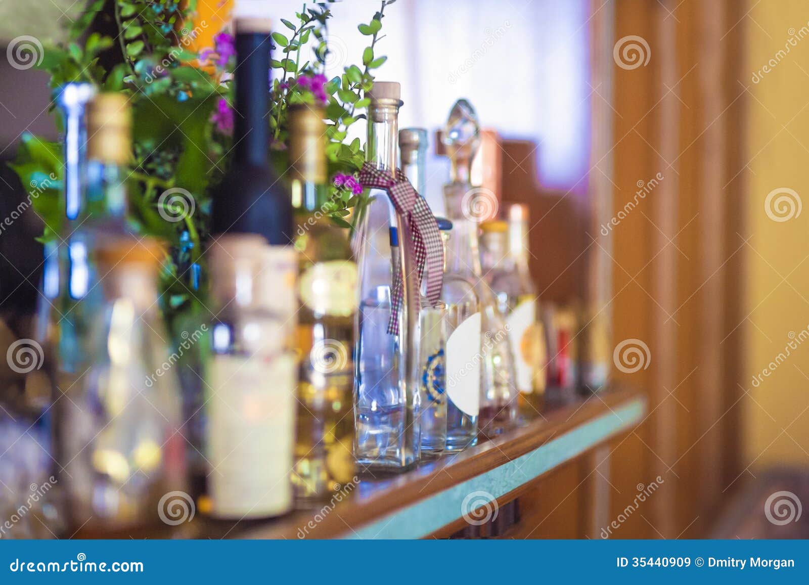 Row of Bottles with Alcohol in a Restaurant Stock Image - Image of ...