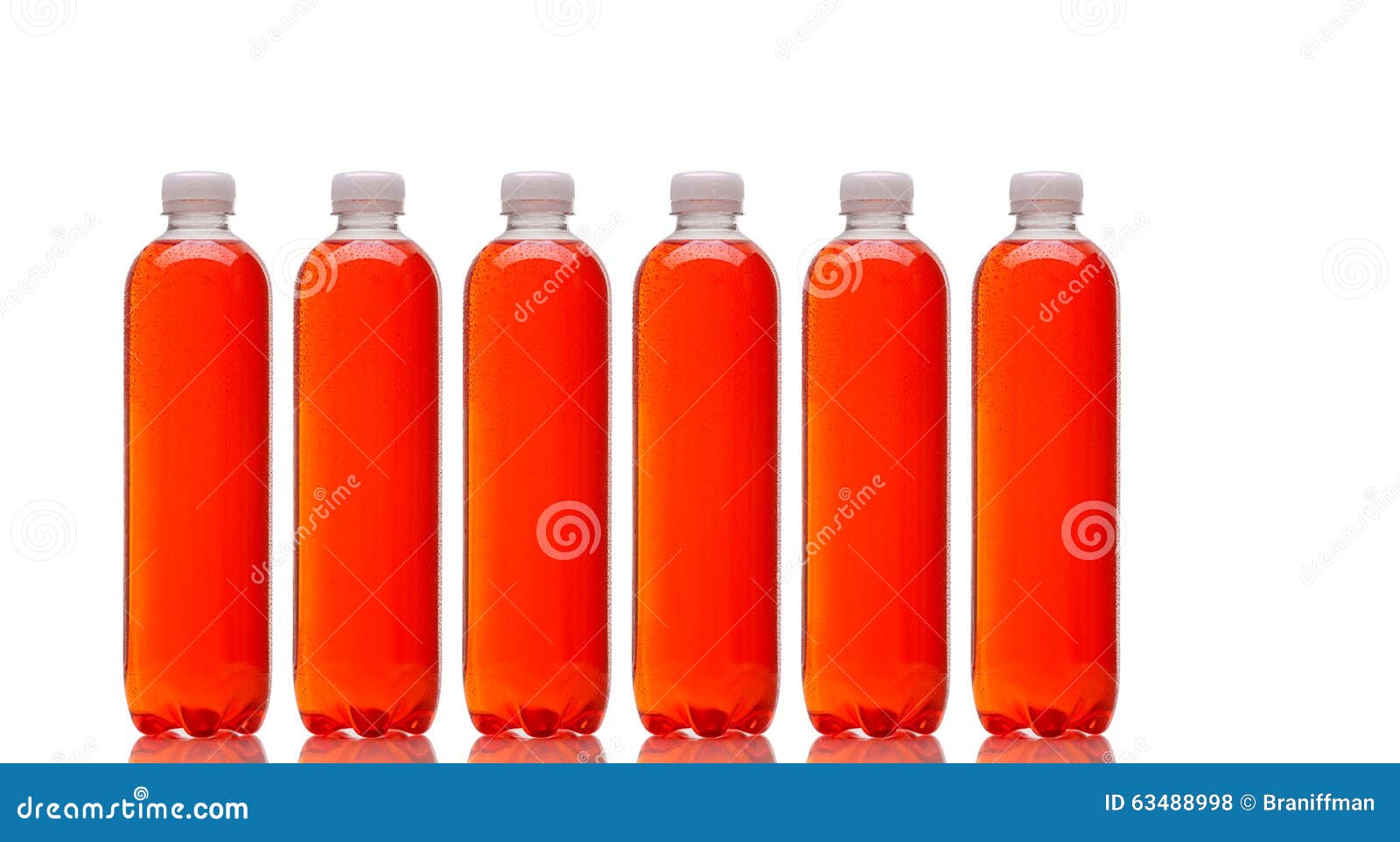 Row of Bottles with Red Beverage Stock Photo - Image of condensation ...