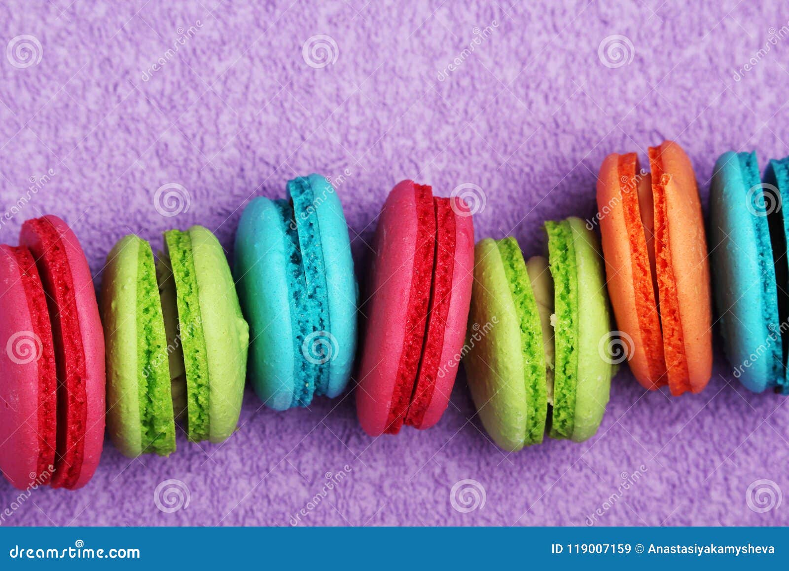 A row of macarons stock image. Image of macaroons, colorful - 119007159