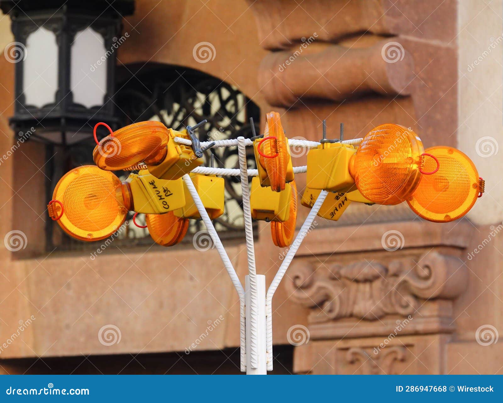 Row of bright streetlights stock photo. Image of peaceful - 286947668