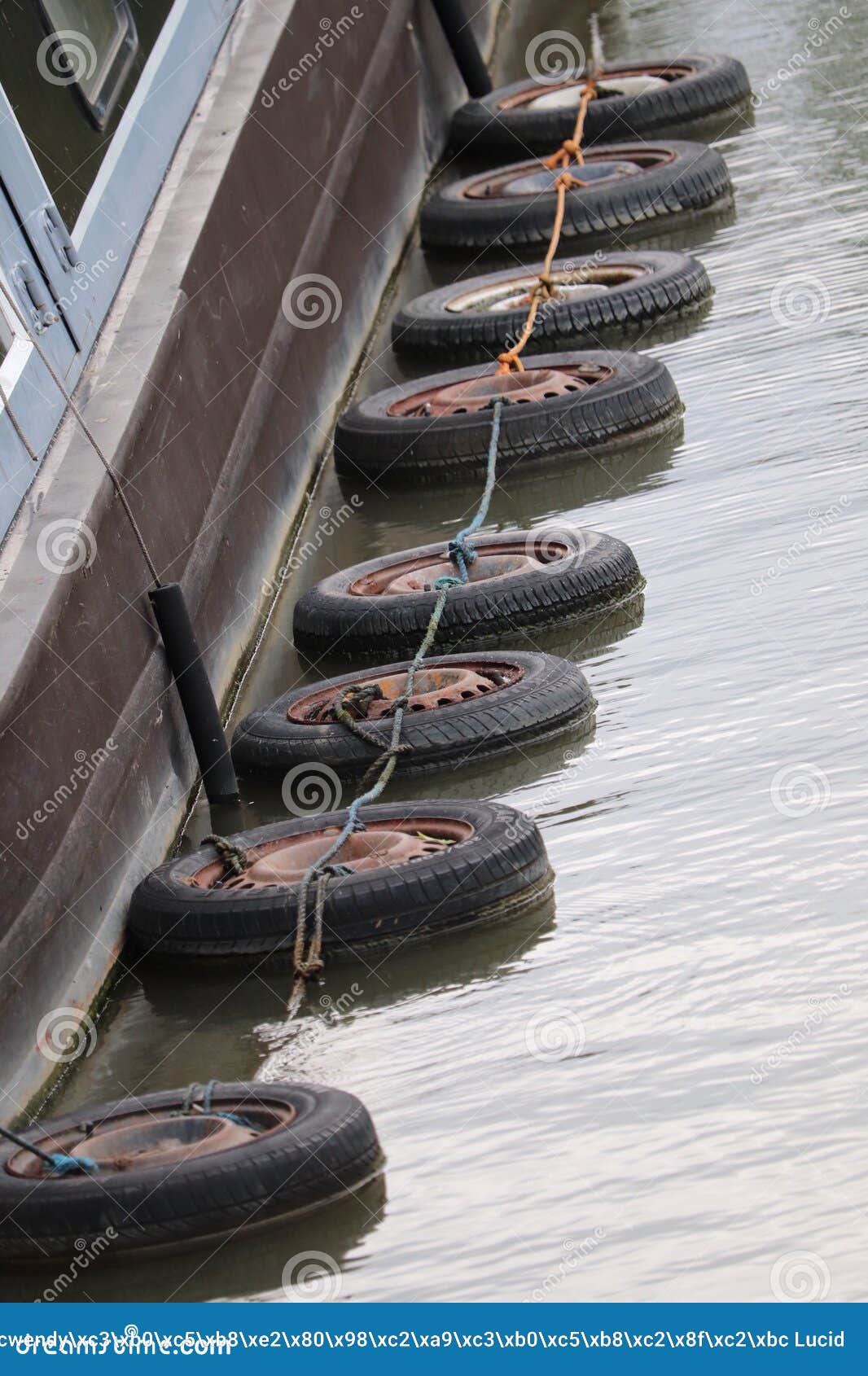 Row of Buffer Tyres Attached To a Narrow Boat Stock Photo - Image of ...