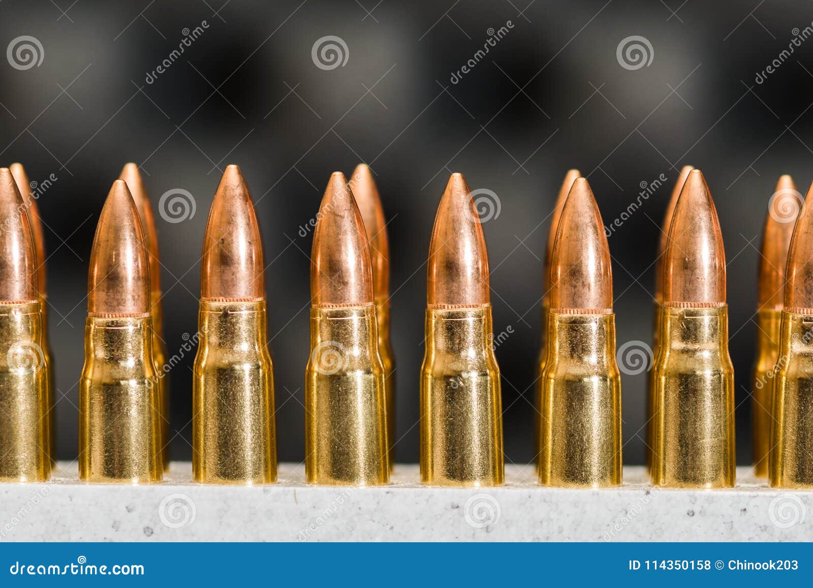 Row of Bullets or Ammunition Stock Photo - Image of container, safety ...