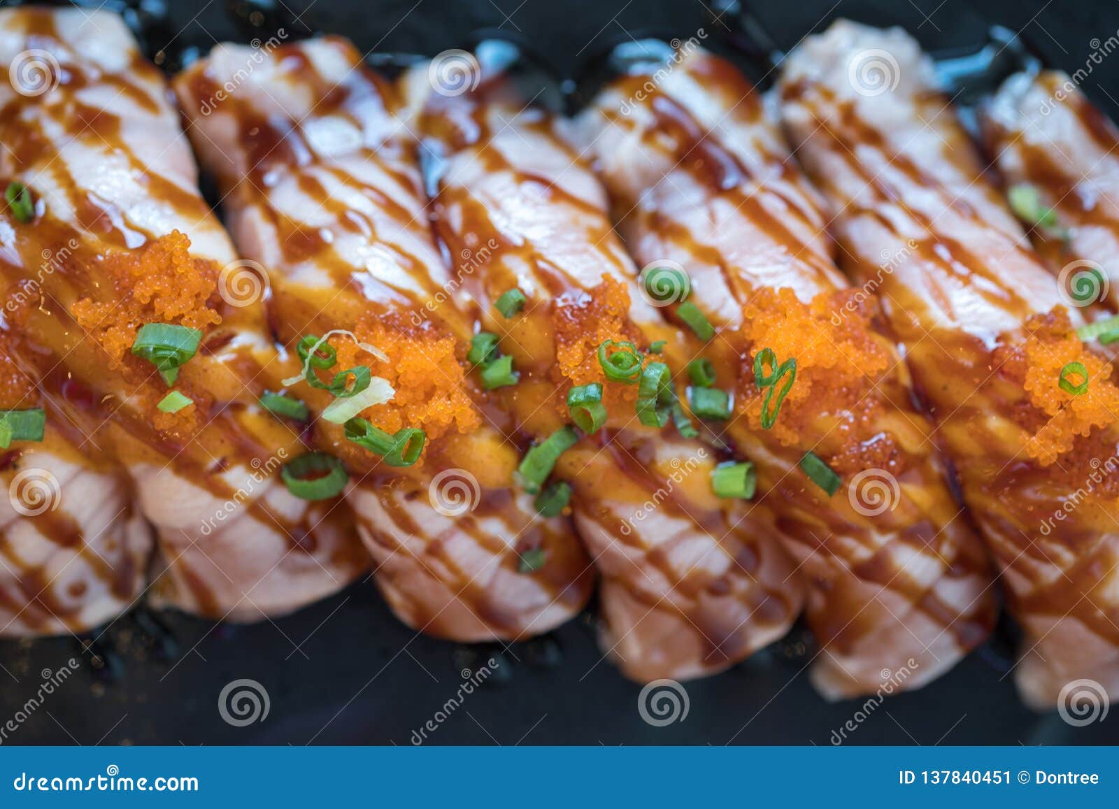 Row of Burned Salmon with Sauce Stock Image - Image of portion, closeup ...