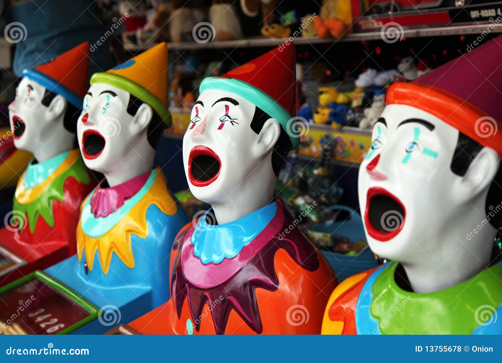 Row of carnival clowns stock photo. Image of amusement - 13755678