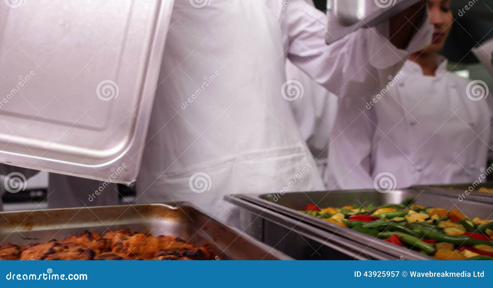 Row of Chefs Lifting Lid Off Serving Trays Stock Video - Video of ...