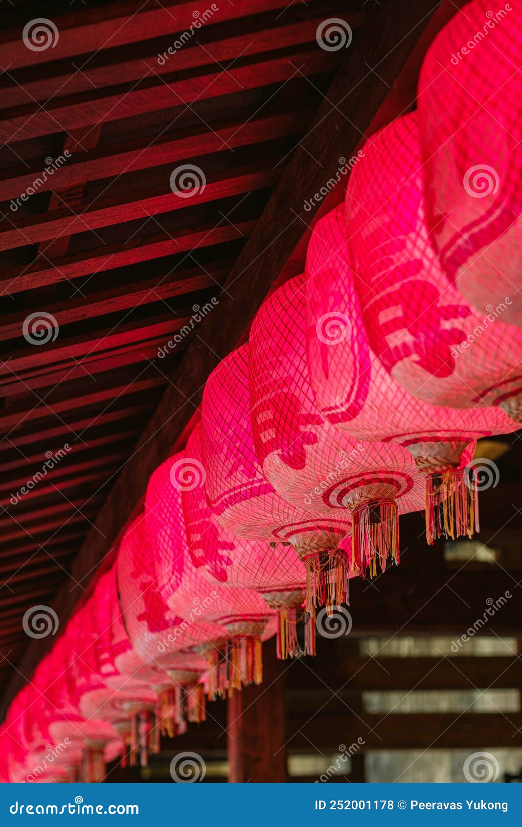 A Row of Chinese Red Lanterns Hang on the Ceiling Stock Photo - Image ...