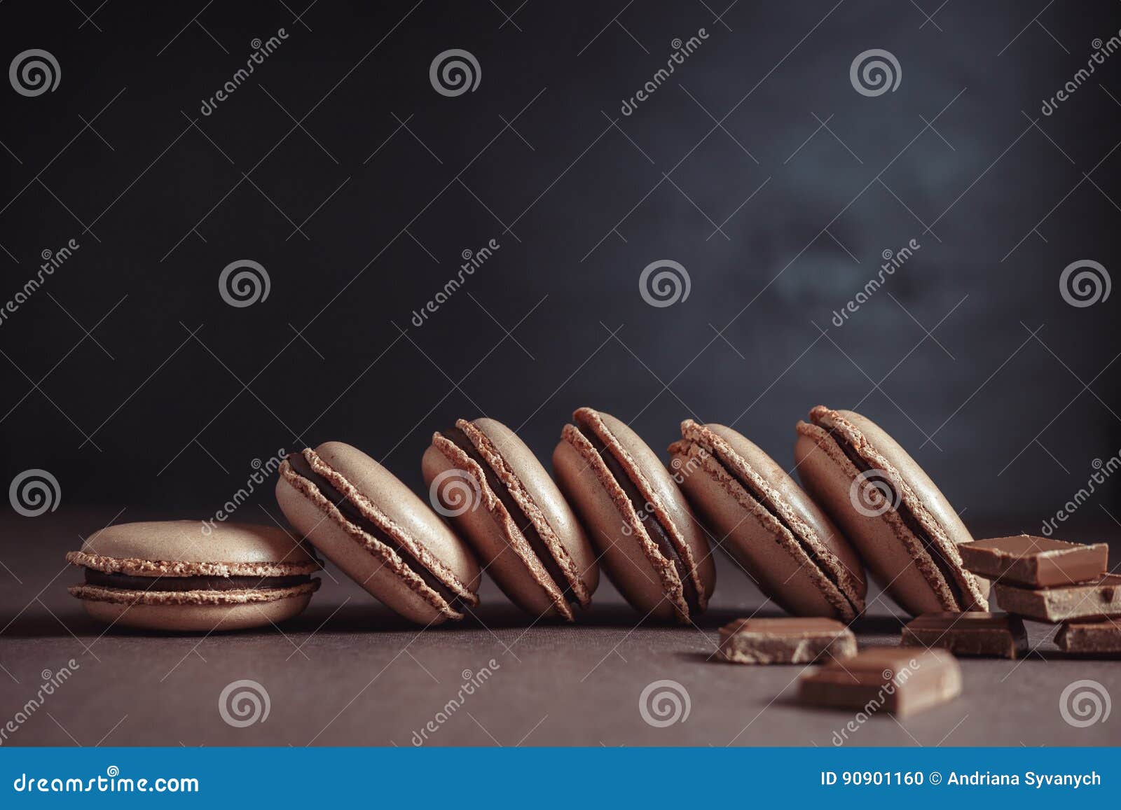 Row of Chocolate Pastel Brown Macarons or Macaroons Stock Photo - Image ...