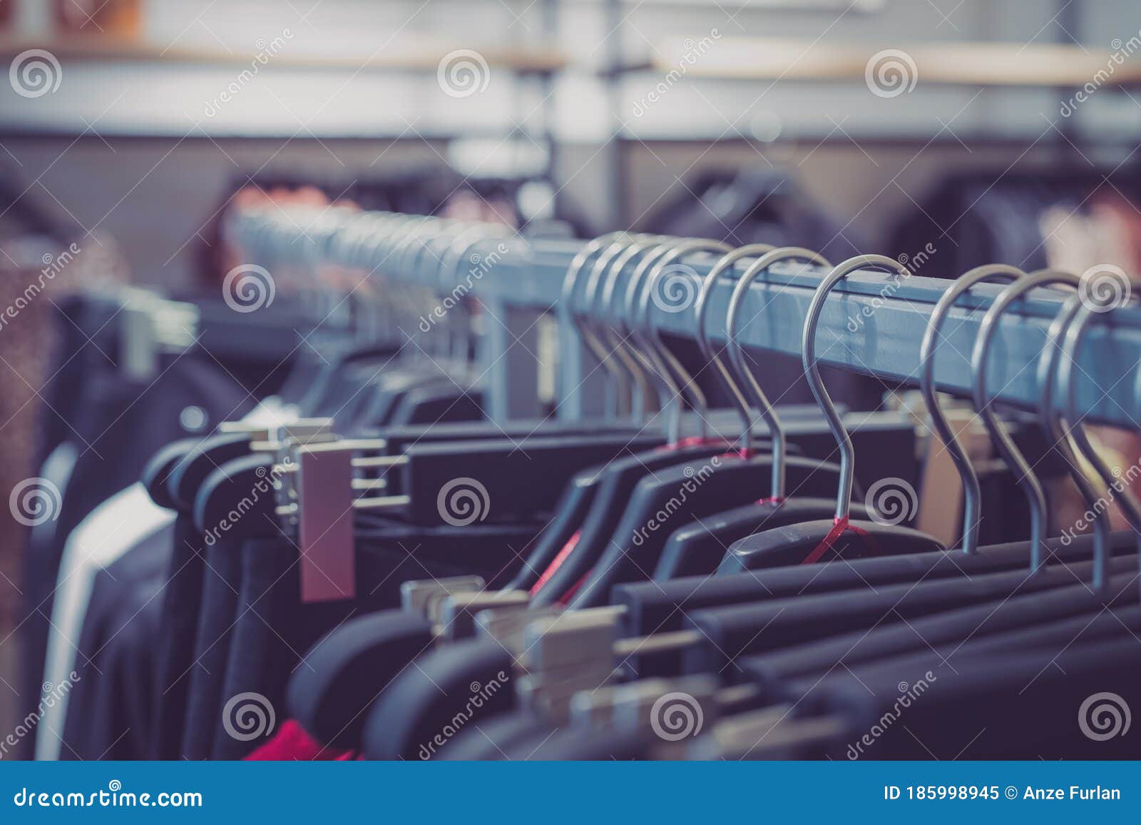Row of clothes in a shop stock image. Image of cloth - 185998945
