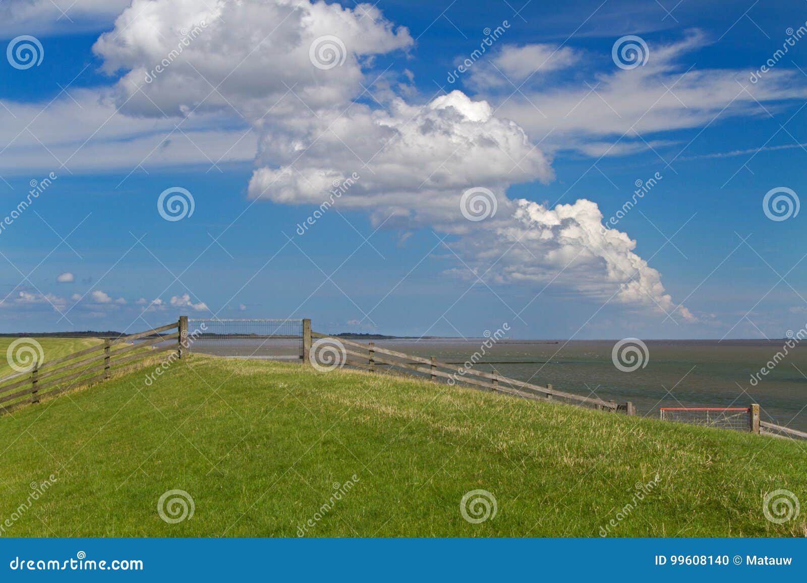 Row of clouds above stock photo. Image of coastal, long - 99608140