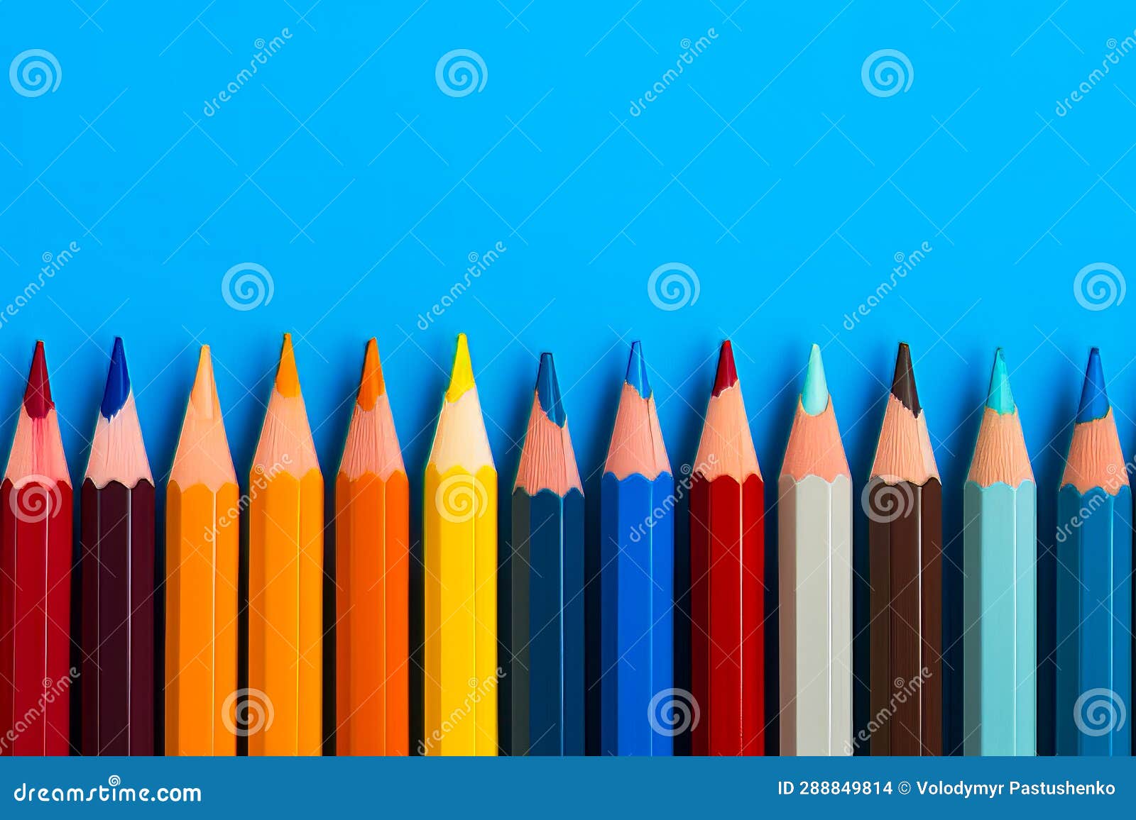 Row of Colored Pencils Lined Up Against Blue Background. Generative AI ...