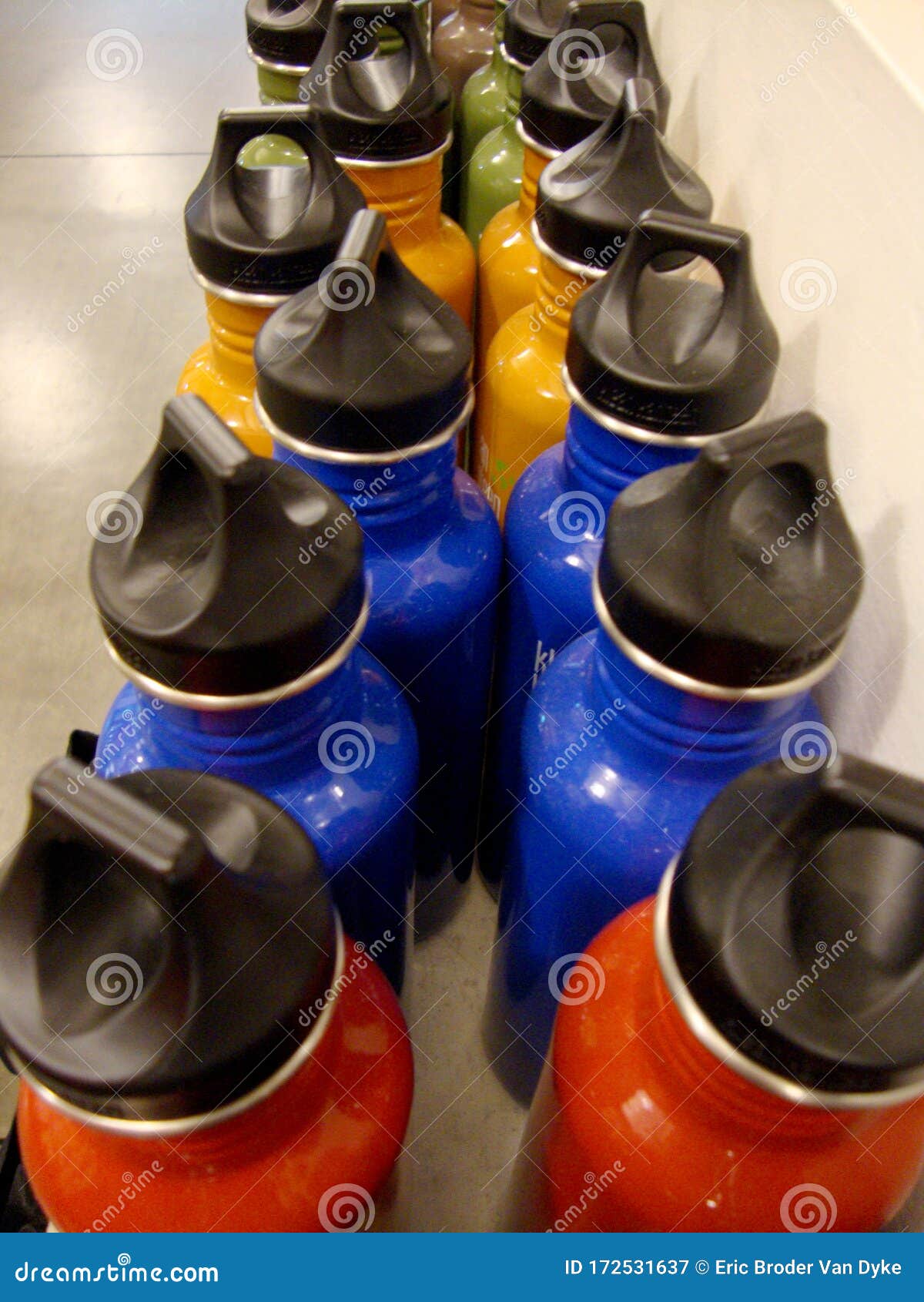 Row of Colored Water Bottles Stock Image - Image of canteen, metal ...