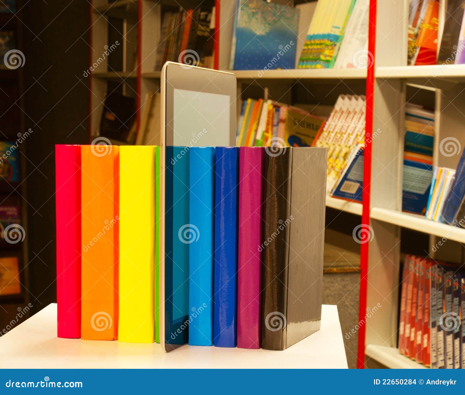 Row of Colorful Books and Tablet PC Stock Photo - Image of technology ...