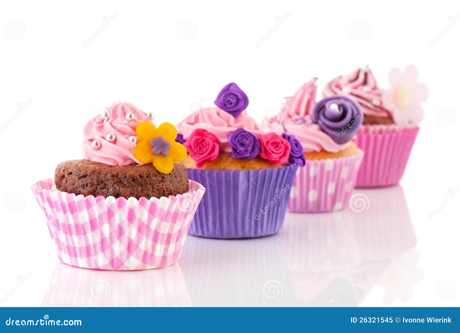 Row colorful cupcakes stock image. Image of sprinklets - 26321545