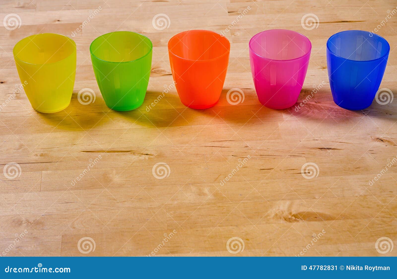Row of Colorful Plastic Cups Stock Image - Image of arrangement, clean ...