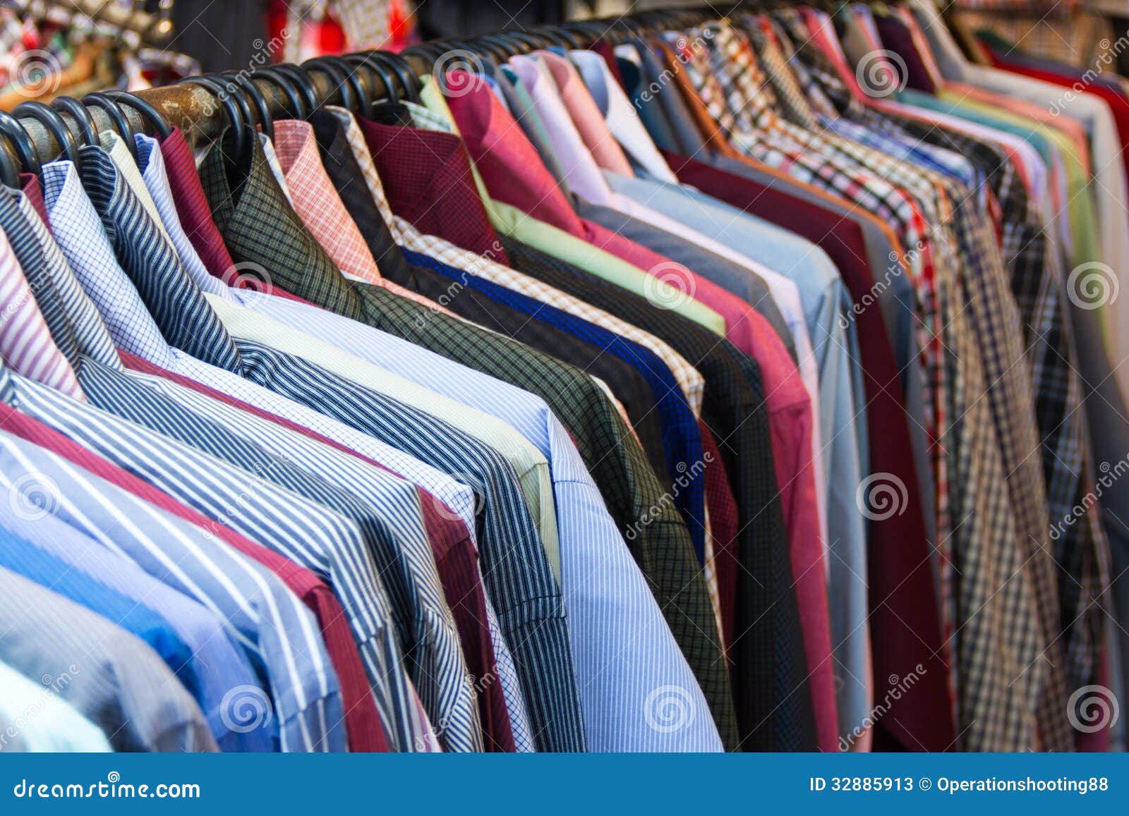 Row of colorful row shirts stock image. Image of hang - 32885913