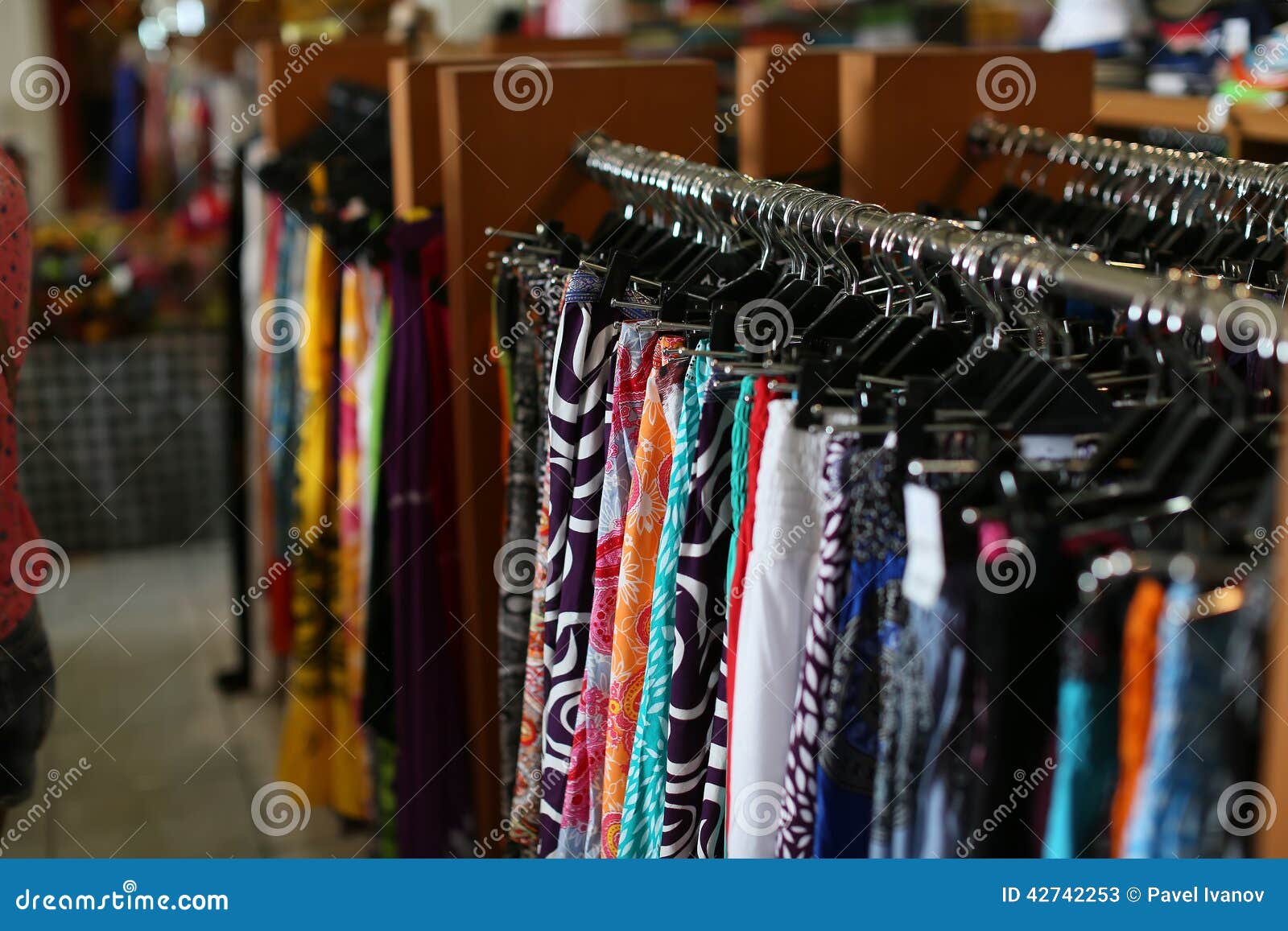 Row of Colorful Things Hanging on the Hanger Stock Image - Image of ...