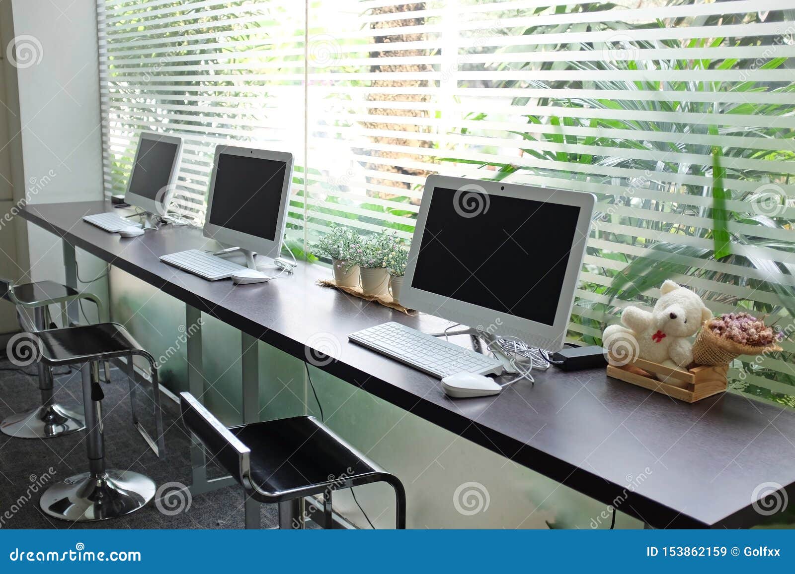 Row of Computers Waiting for People Use at Internet Cafe Stock Image ...