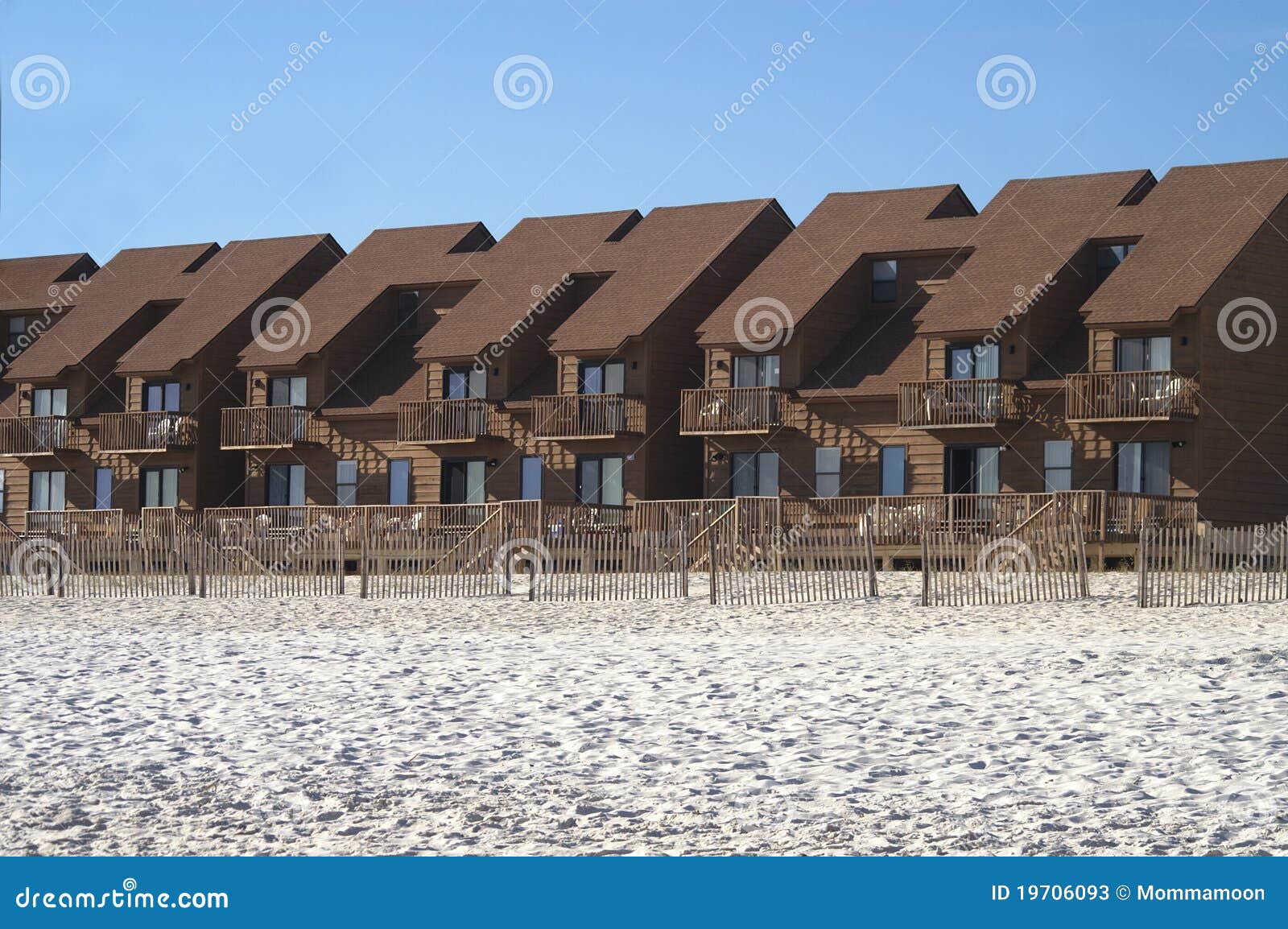 Row of Condos on Beach stock image. Image of apartment - 19706093