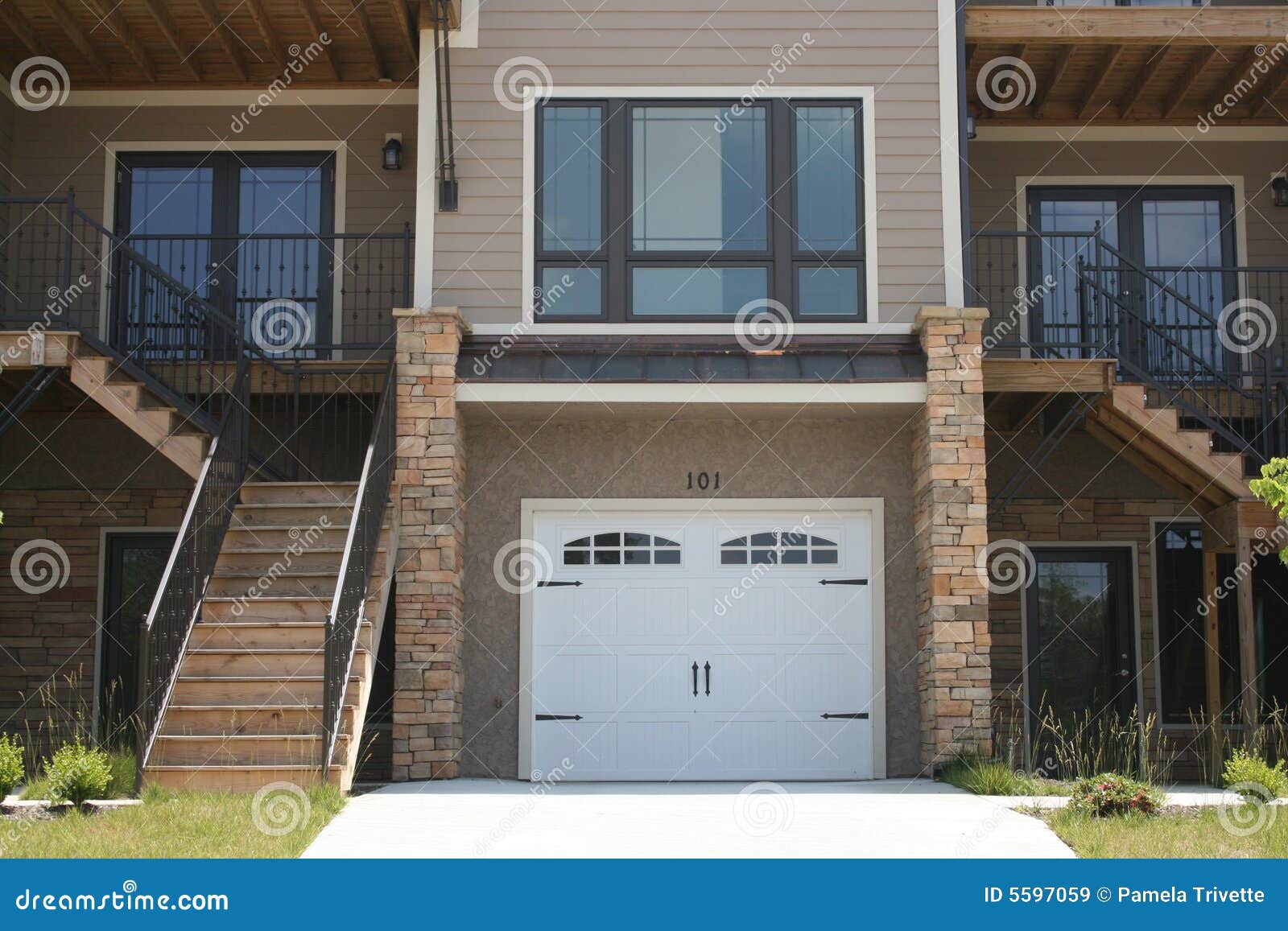 Row of Condos GARAGE stock image. Image of real, home - 5597059