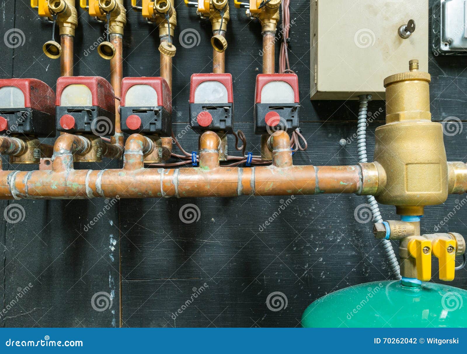 Row of Copper Pipes with Control Unit Stock Photo - Image of control ...