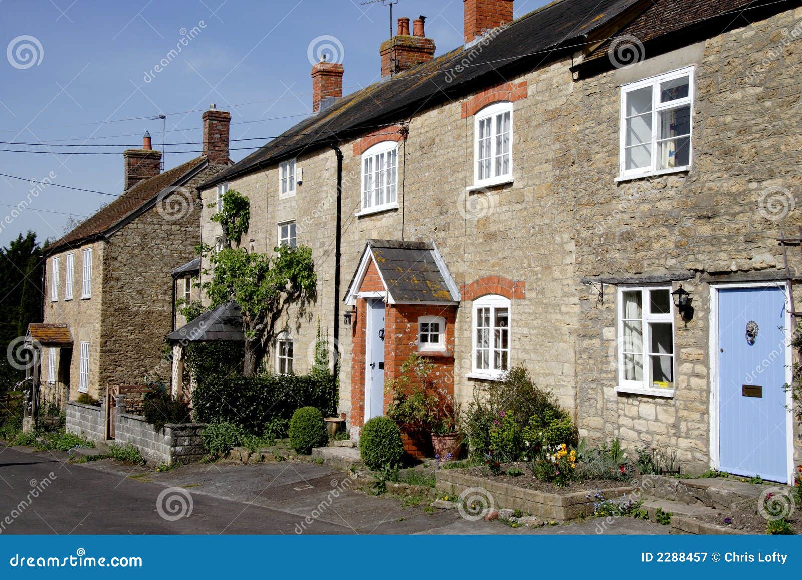 Row of Cottages stock image. Image of porch, house, street - 2288457