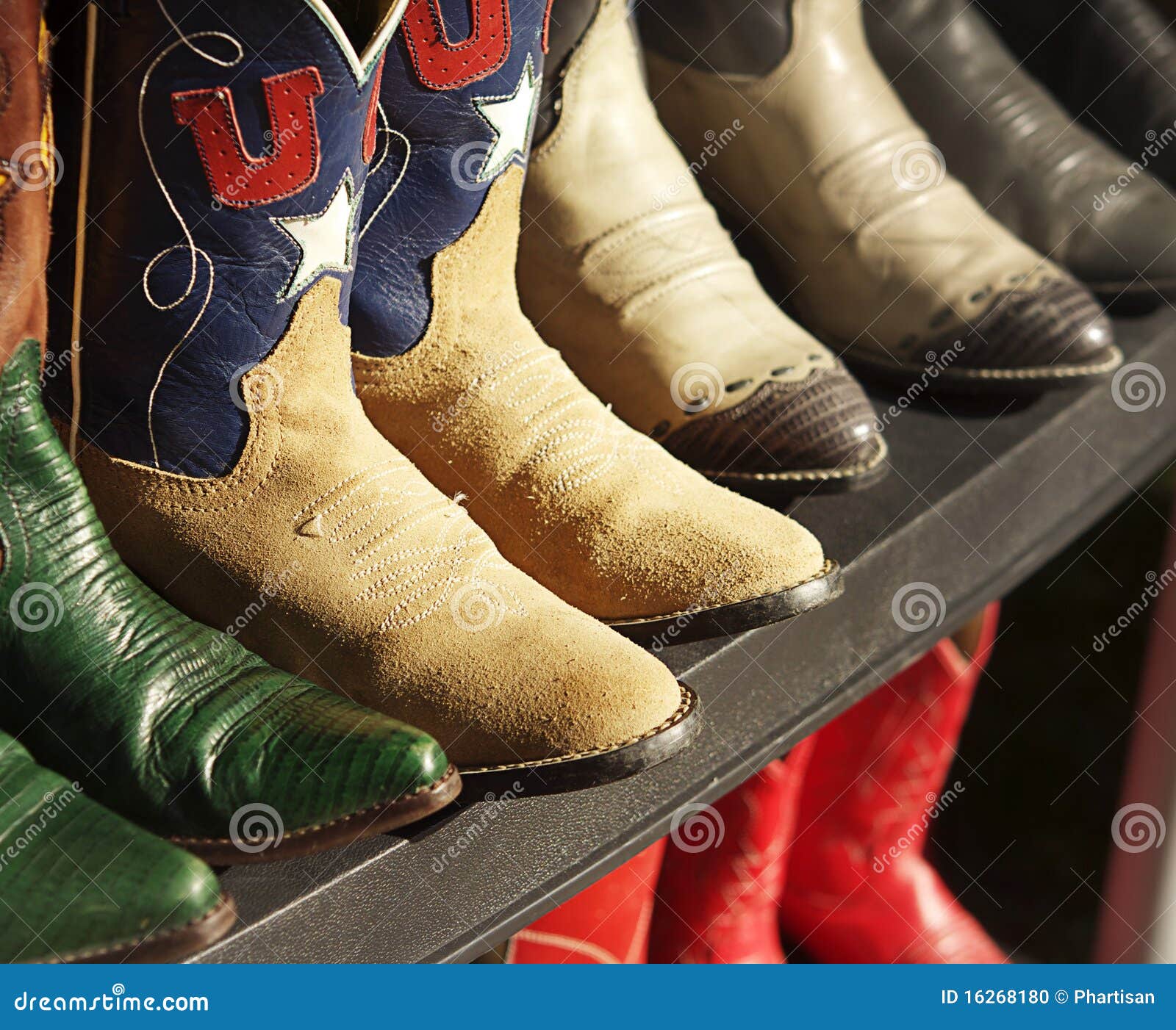 Row of cowboy boots stock photo. Image of footwear, style - 16268180
