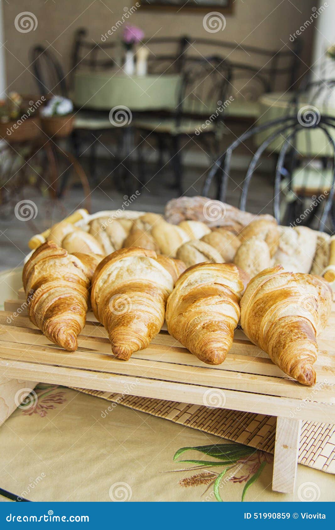 Row of Croissants on table stock image. Image of parisian - 51990859