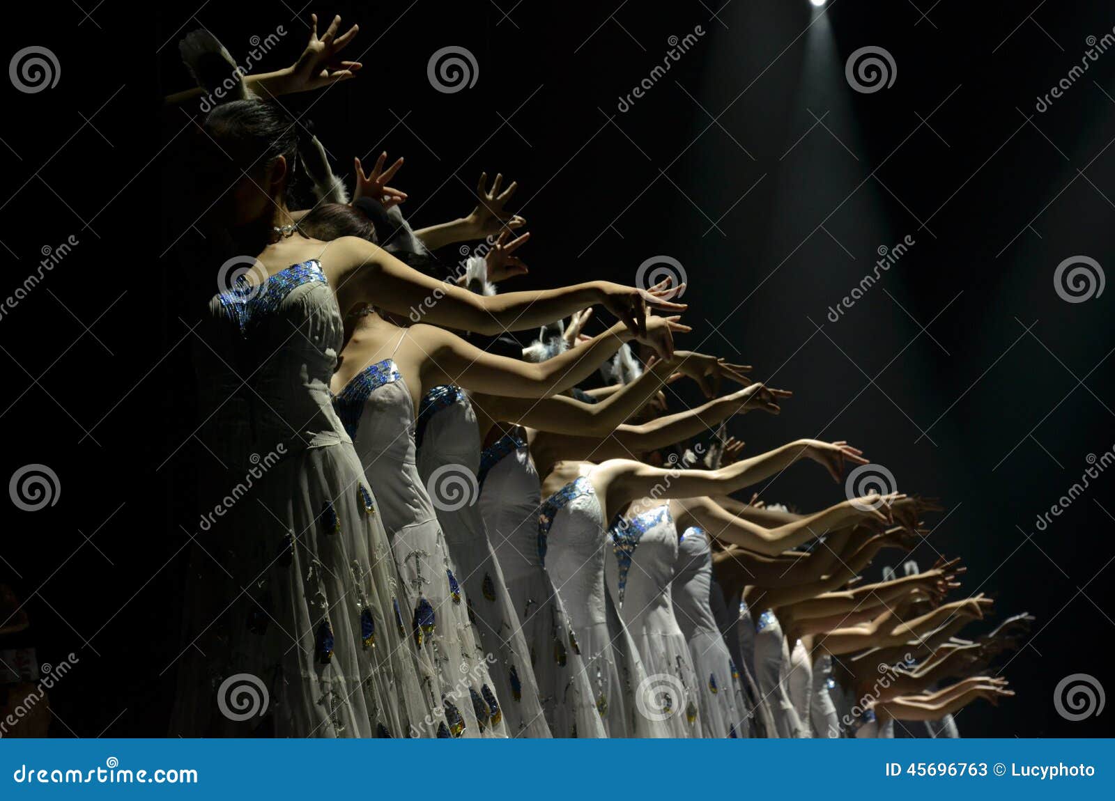 A Row of Dancers are Making Beautiful Posture Stock Image - Image of ...