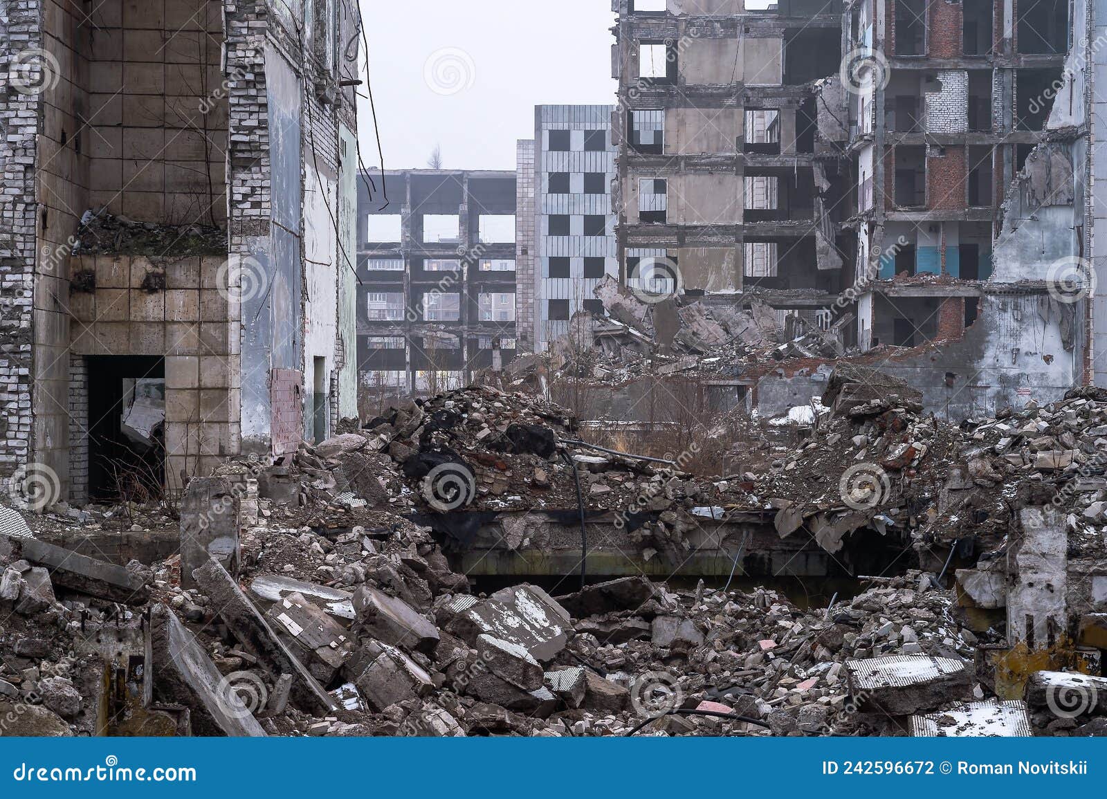 A Row of Destroyed Buildings Against the Gray Sky. Background Stock ...