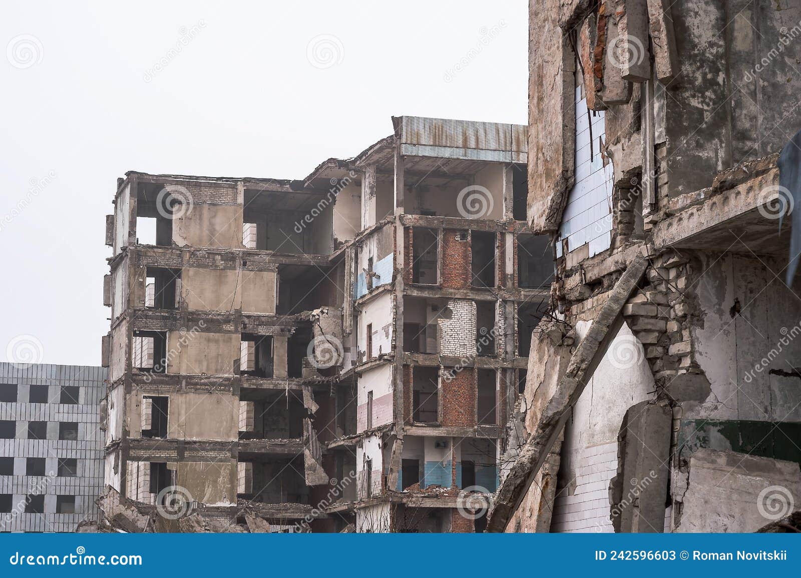 A Row of Destroyed Buildings in Close-up Against the Gray Sky ...
