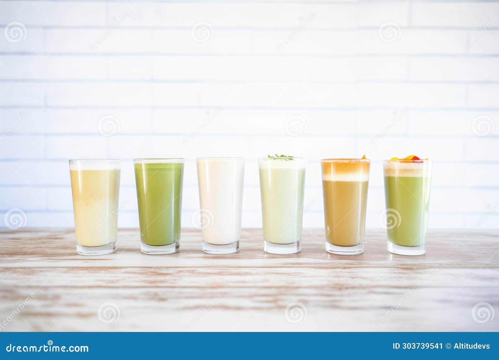 A Row of Different Lattes with Matcha Latte in the Center Stock Image ...