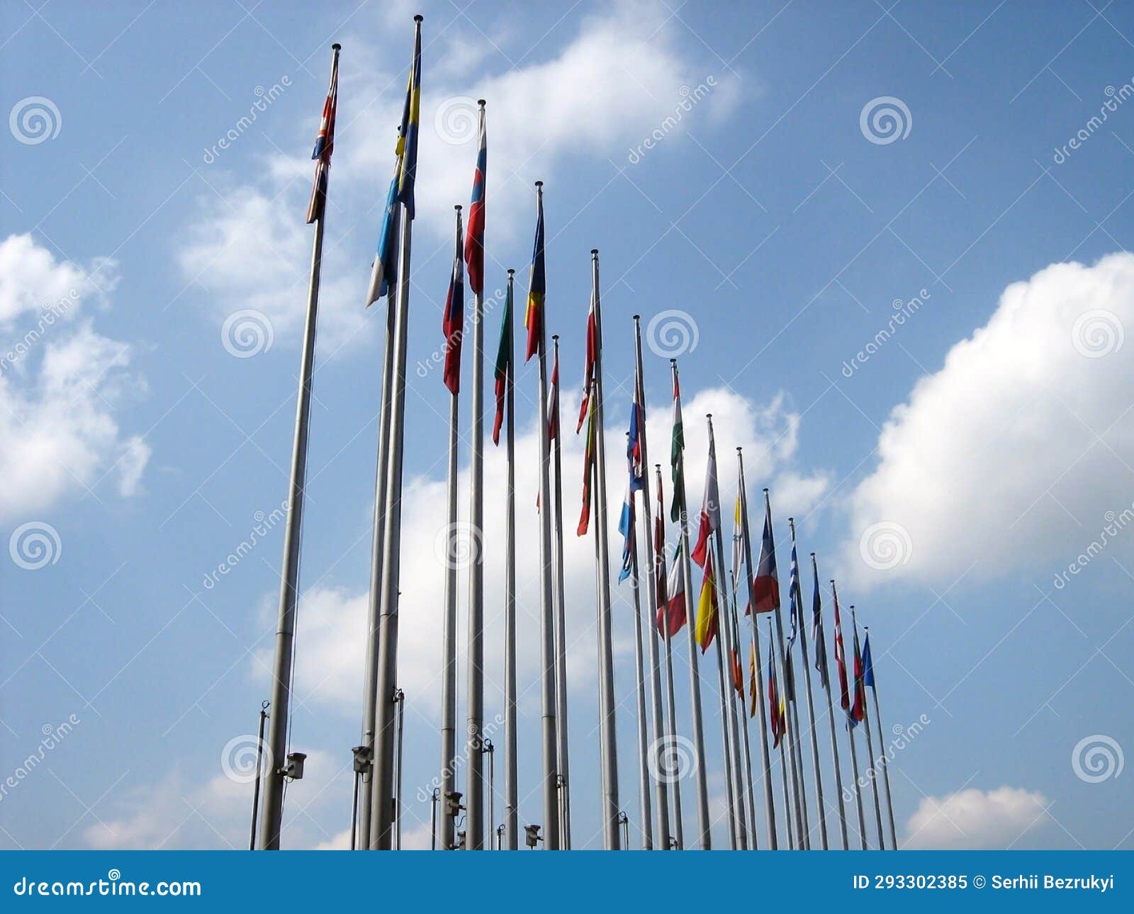 A Row of Different National Flags of Countries on Flagpoles in ...