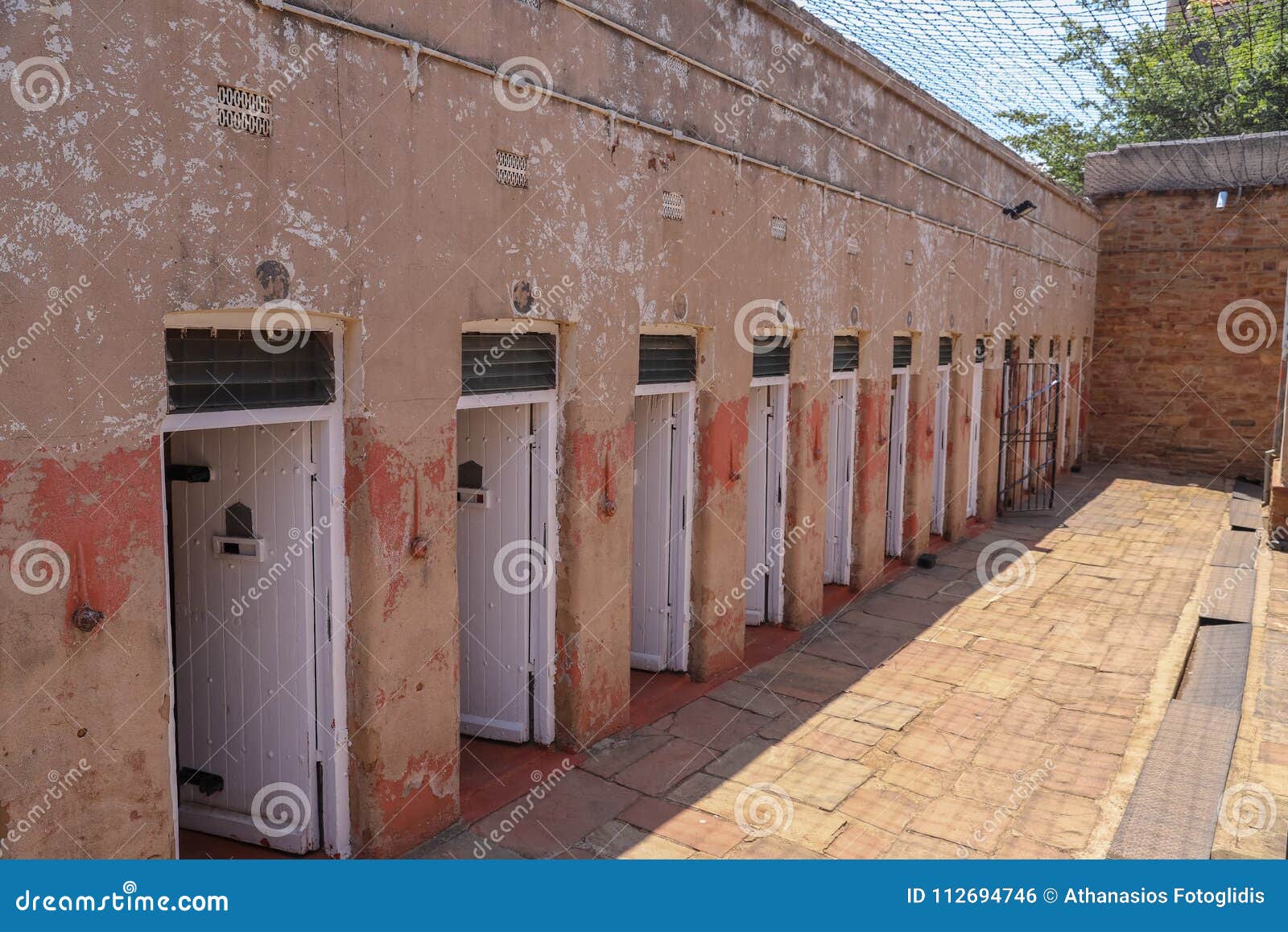 Prison cell doors stock photo. Image of correctional - 112694746