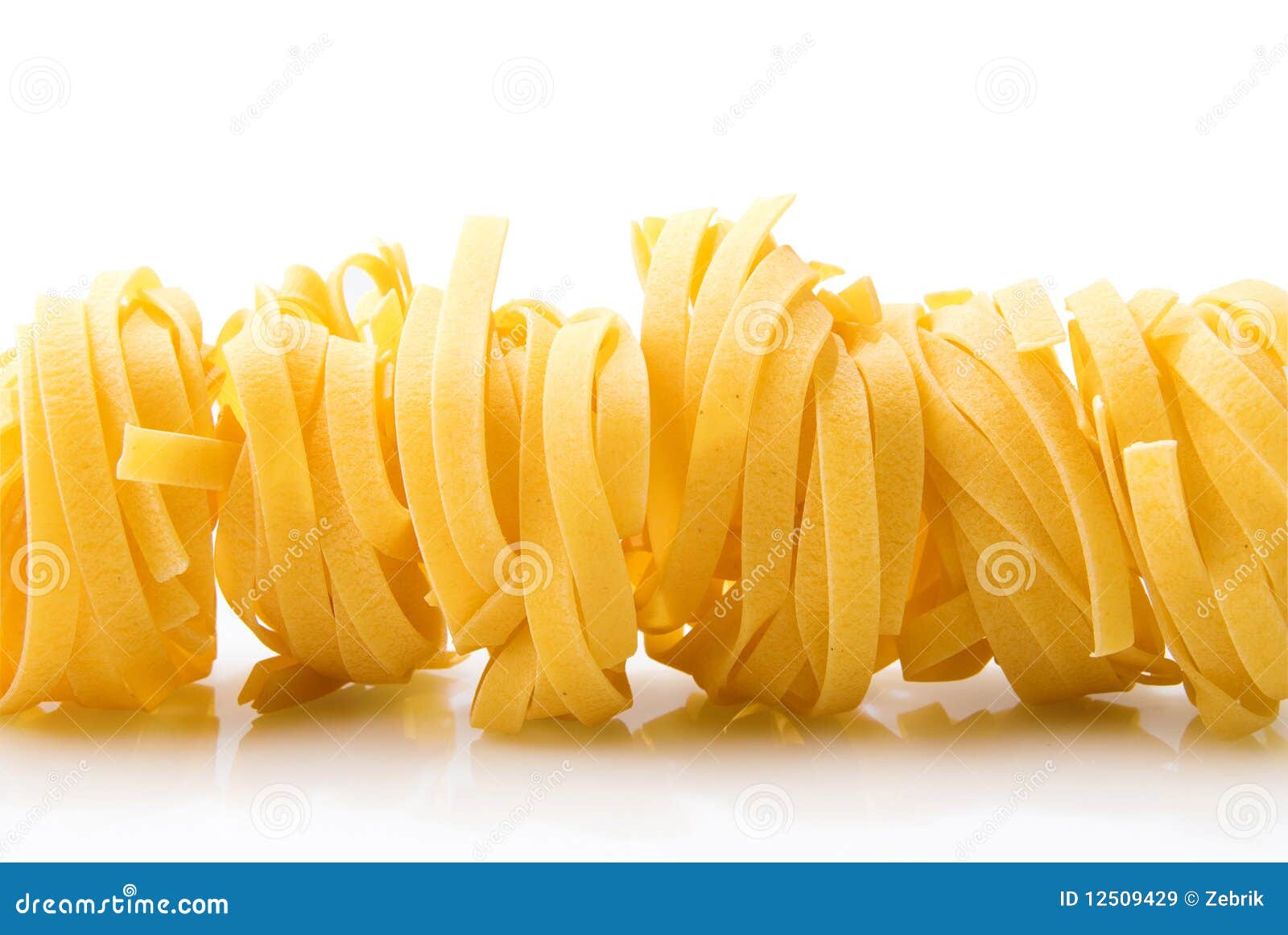 Row Dry Nest Pasta on White with Reflection Stock Image - Image of ...