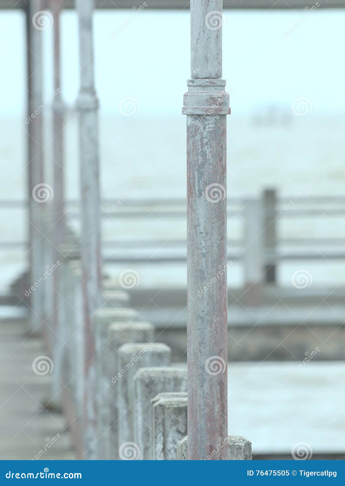 The row of electric posts stock image. Image of bridge - 76475505