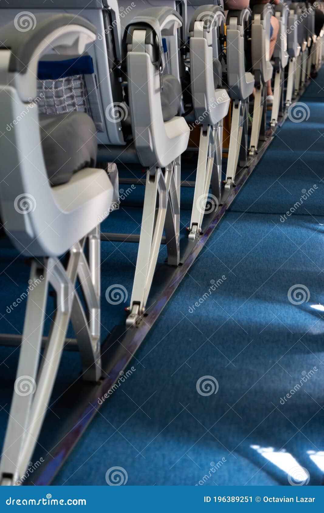 Row of Empty Airplane Seats in Second Class on an International Flight ...
