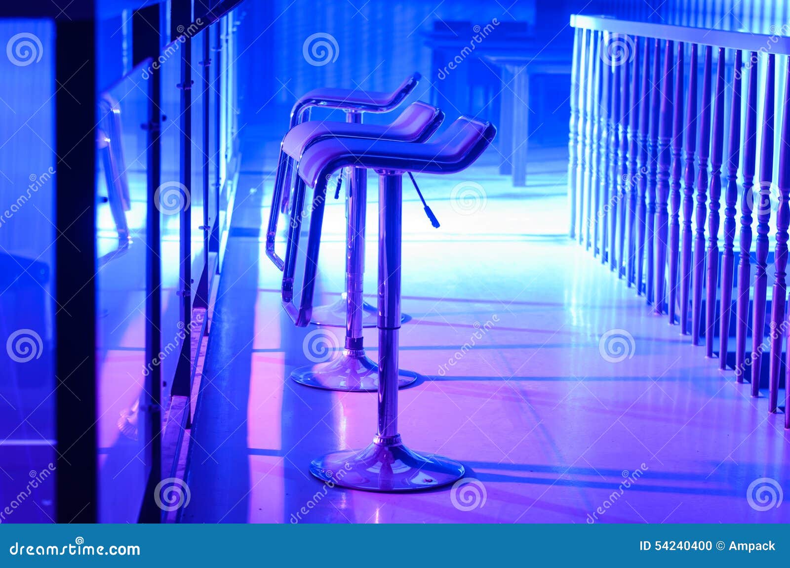 Row of Empty Bar Stools Along Bar in Night Club Stock Photo - Image of ...