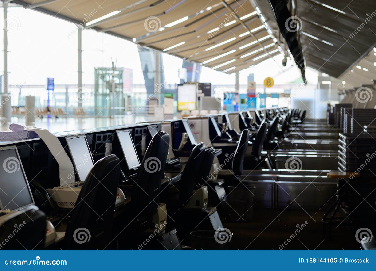 Row of Empty Check-in Desks with Computer Monitors at the Airport Stock ...