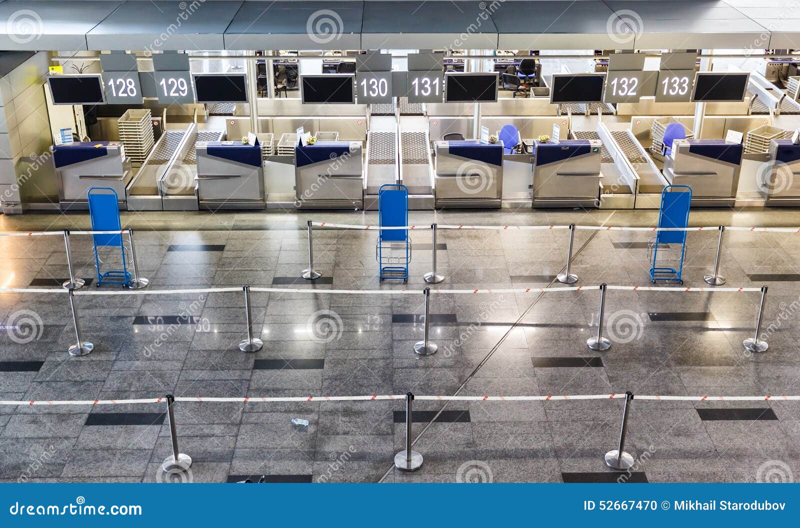 Row empty check-in desks stock photo. Image of inside - 52667470