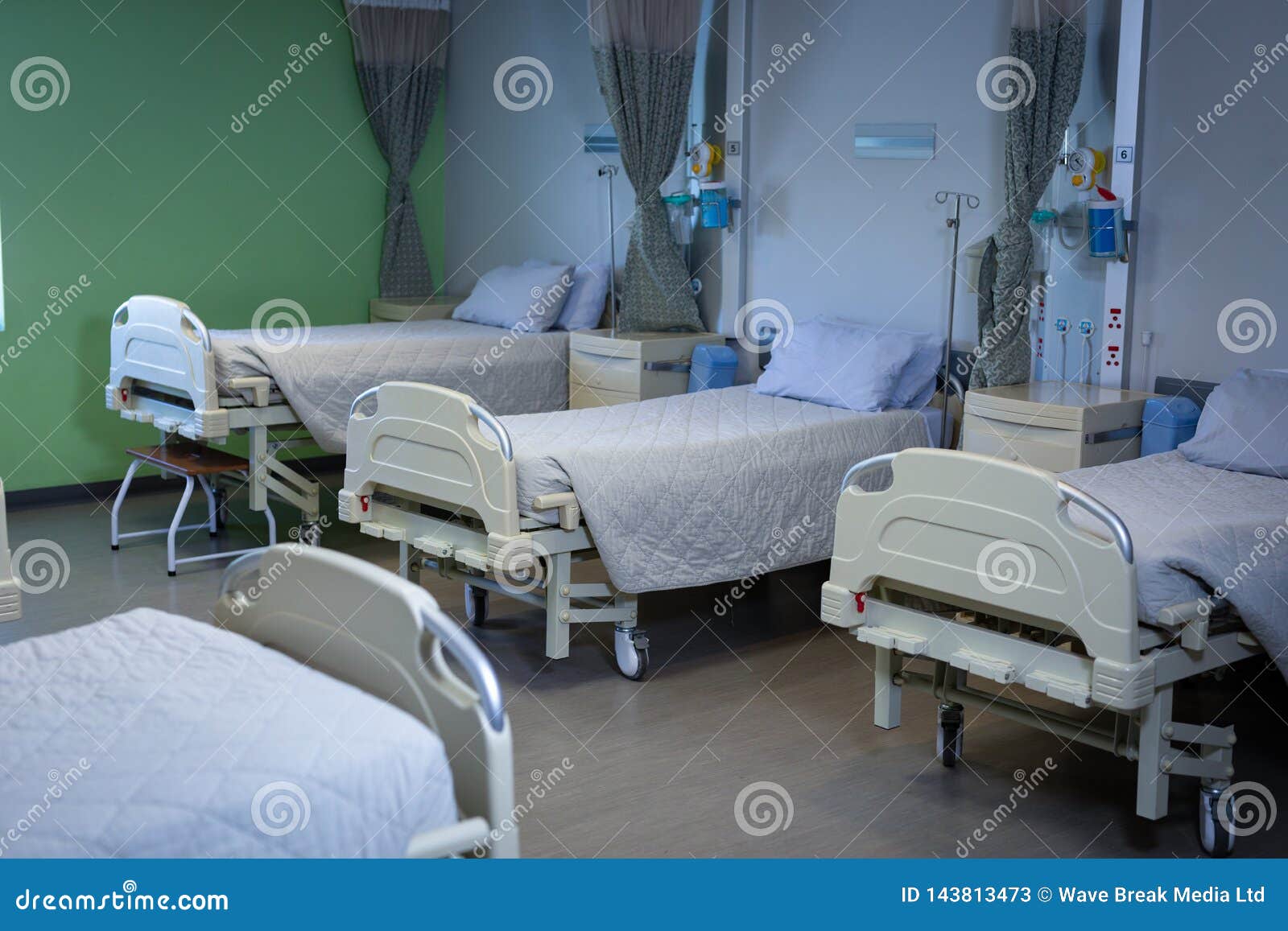 Row of empty hospital beds stock image. Image of clean - 143813473