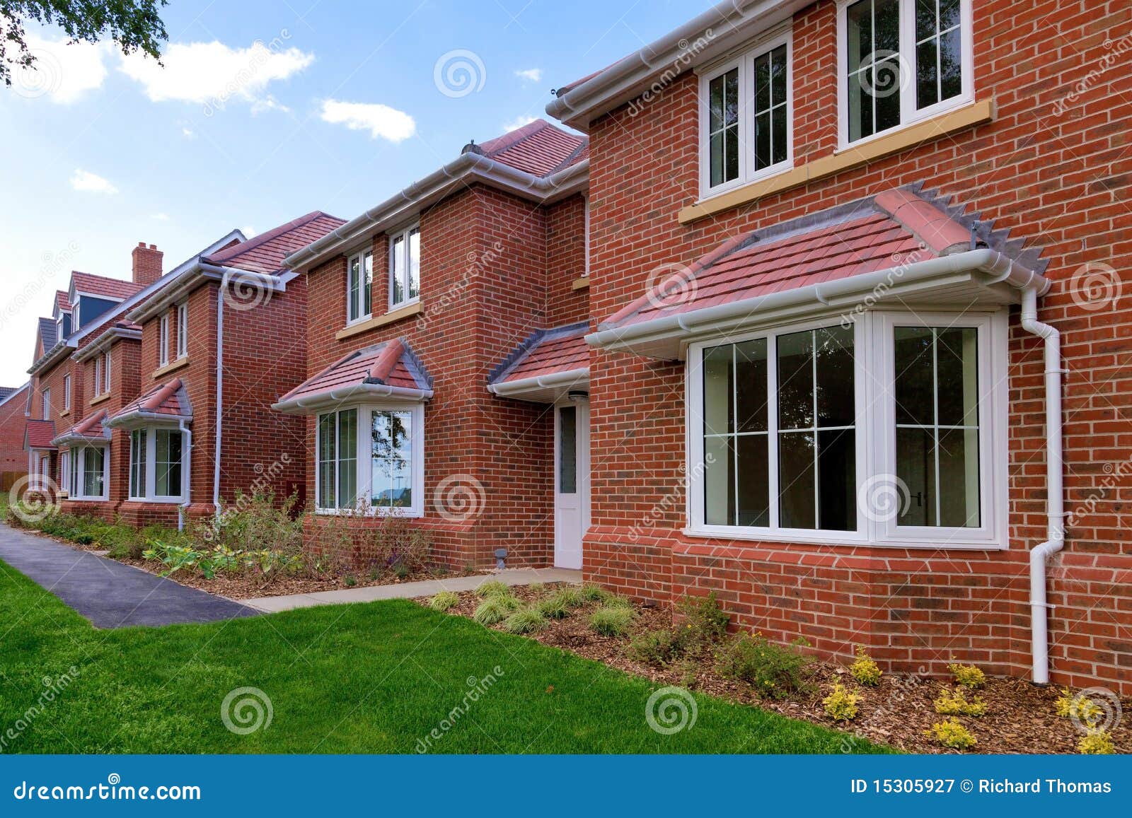 Row of empty new houses stock image. Image of house, home - 15305927