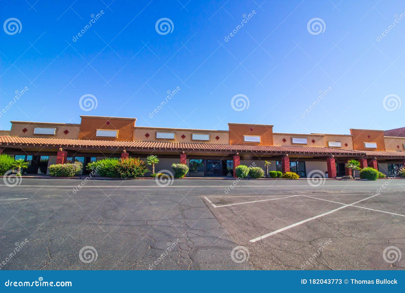 Row of Empty Store Fronts in Commercial Building Stock Image - Image of ...