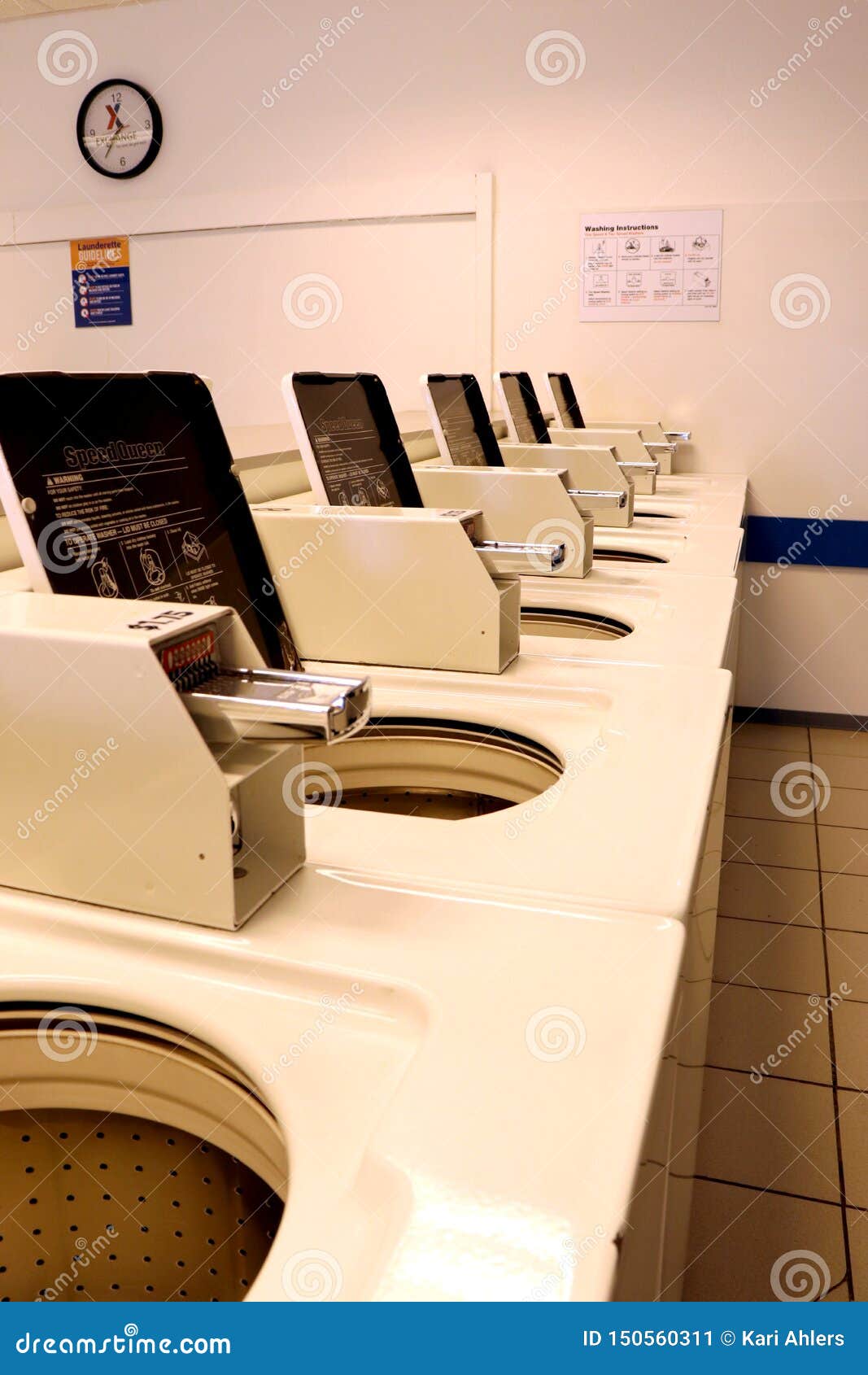 Washing Machines and Coin Slots in a Laundromat Editorial Photo - Image ...
