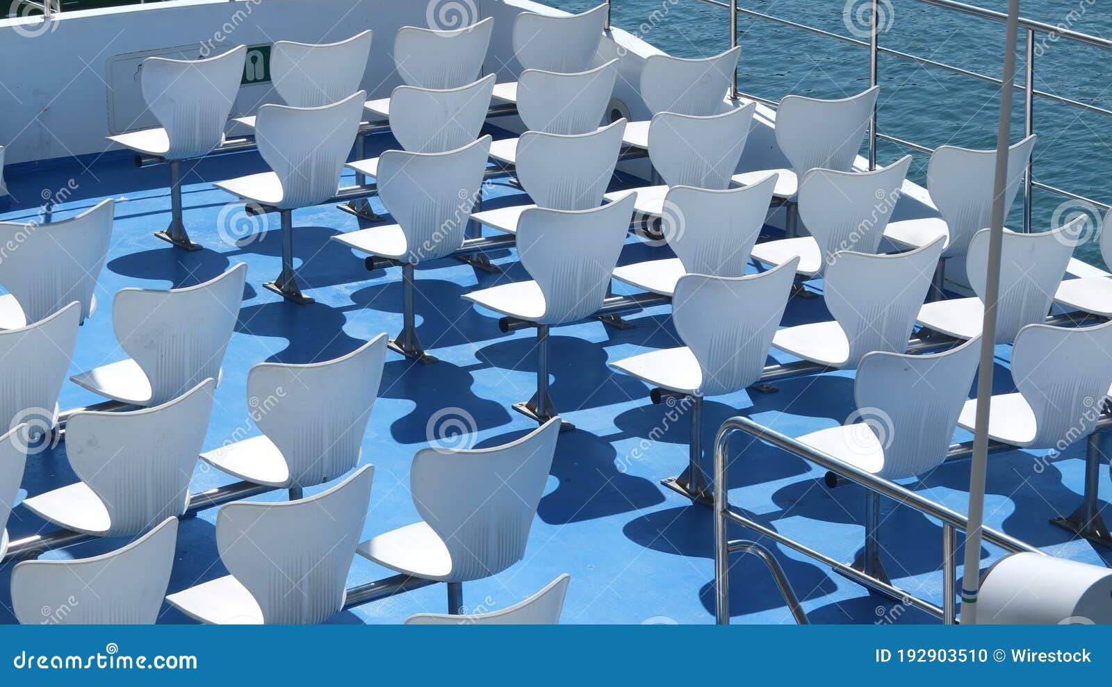 Row of Empty White Chairs for Passengers on the Blue Floor - Sea ...